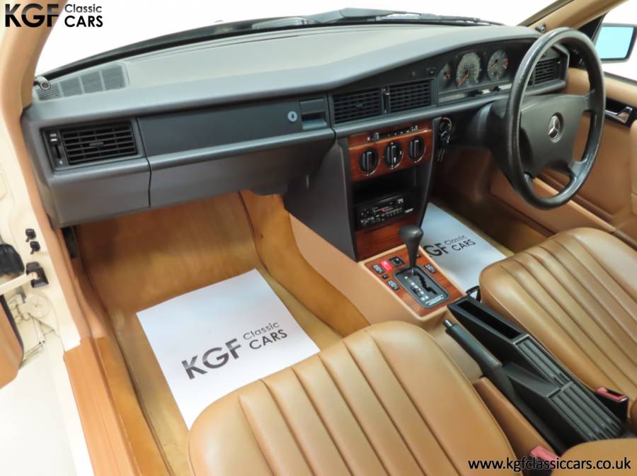 A Mercedes-Benz 190E (W201) Auto with 29 Services, Light Ivory, £ 9,995