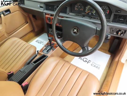 A Mercedes-Benz 190E (W201) Auto with 29 Services, Light Ivory, £ 9,995